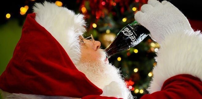 How Coca-Cola Actually Changed Santa's Appearance - The Fact Site